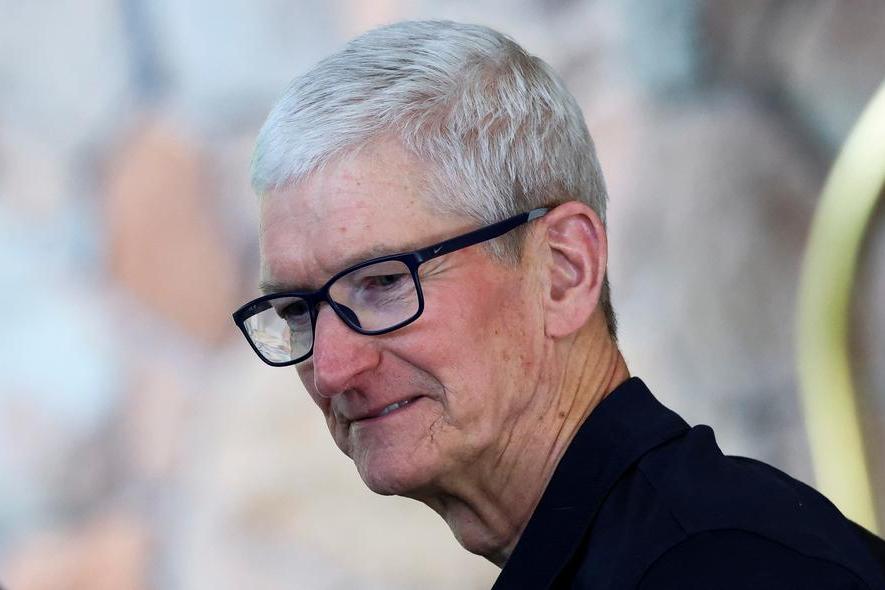 CEO Tim Cook says Apple ready to open its wallet to catch up in AI