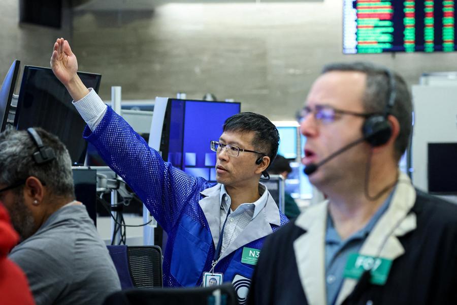 Stocks slip as markets eye US data barrage, Japan PM's meet with BOJ chief