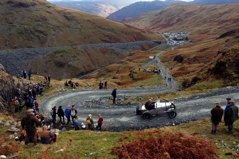 Vintage cars attack British hill climb