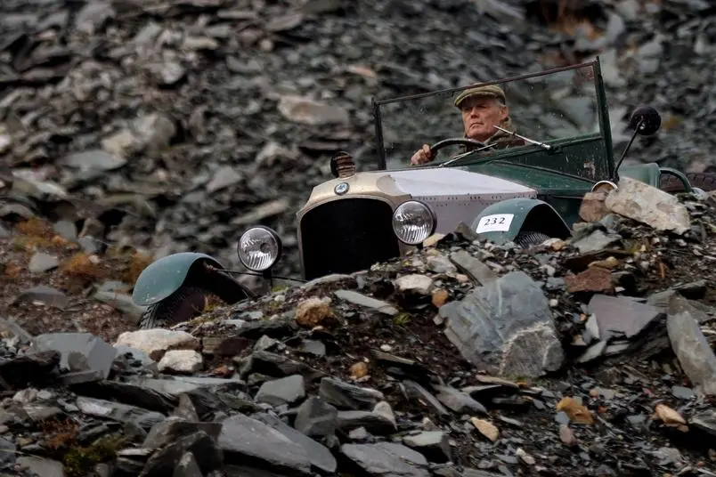 Vintage cars attack British hill climb