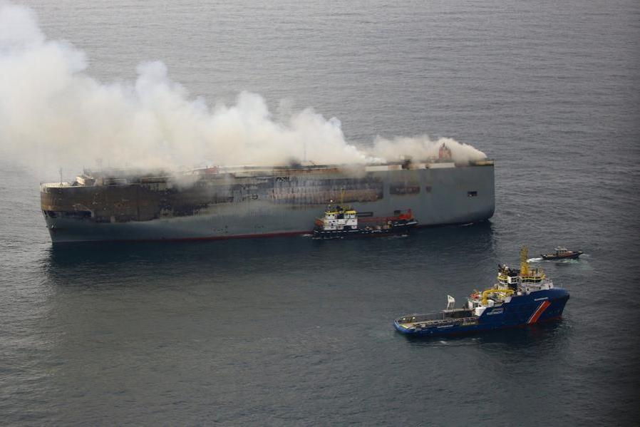 Japanese owner of car carrier ship that caught fire to investigate cause