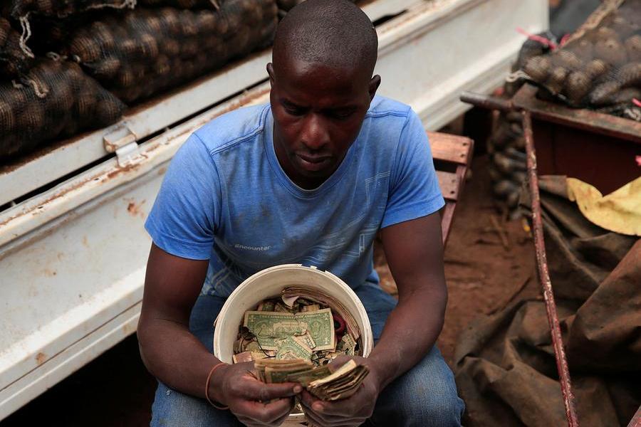 Zimbabwe to introduce new 'structured currency,' c.bank governor says