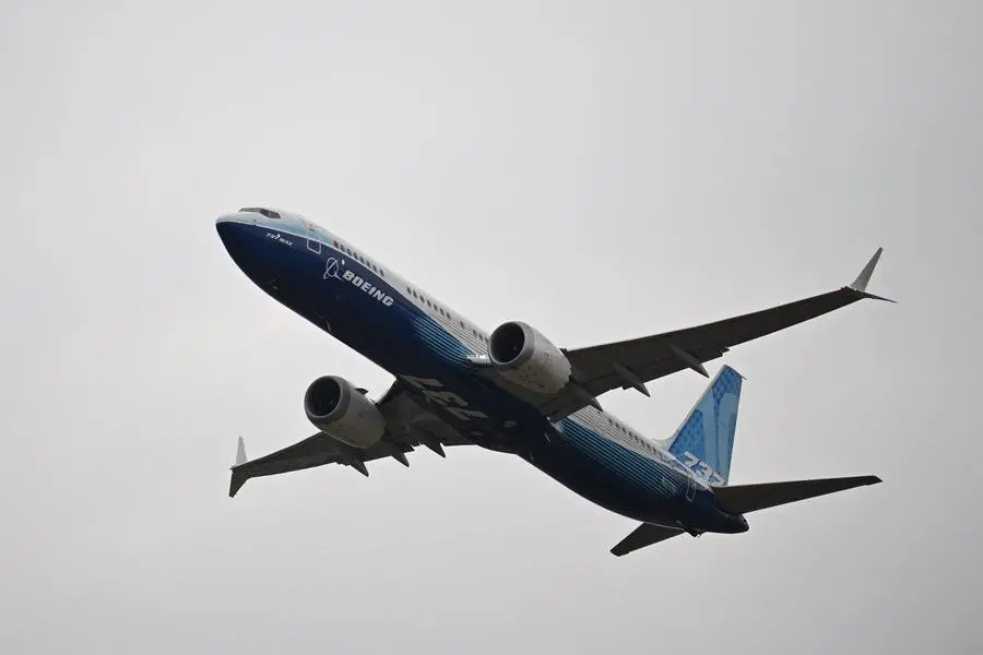 Boeing cuts 2023 forecast for 737 deliveries as it reports loss