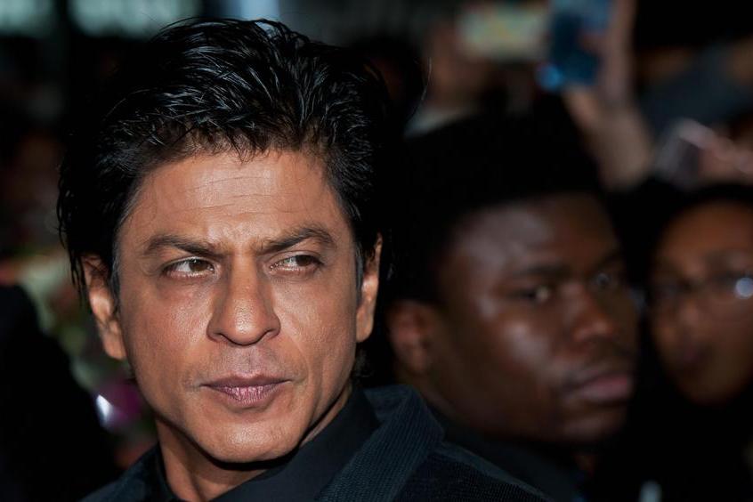 Shah Rukh Khan strikes famous pose as he receives award at SIBF