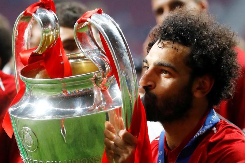 Liverpool's Salah returns to training after two-week absence with ...