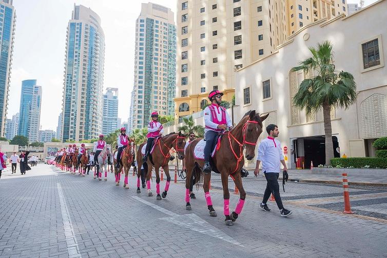 Pink Caravan Equestrian Brigade strides through Dubai streets with cheers of awareness