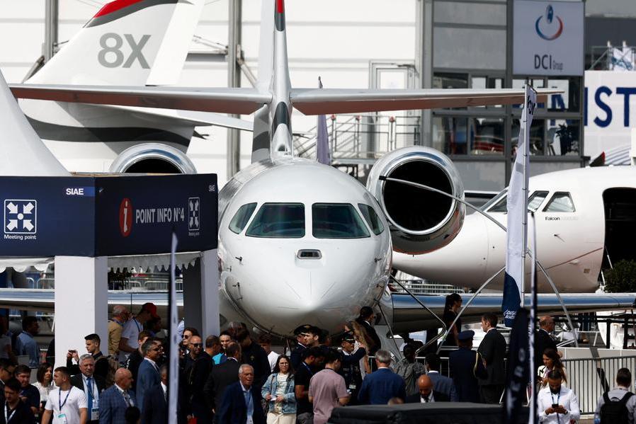 Paris air show takes off with historic plane order