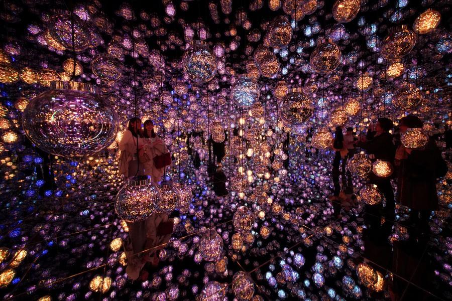 Cascading light and 'wobbling' orbs at new Tokyo art museum
