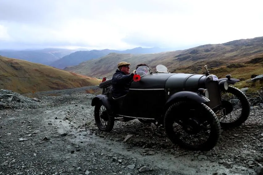 Vintage cars attack British hill climb