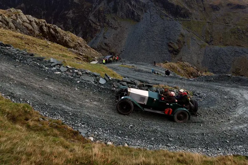 Vintage cars attack British hill climb