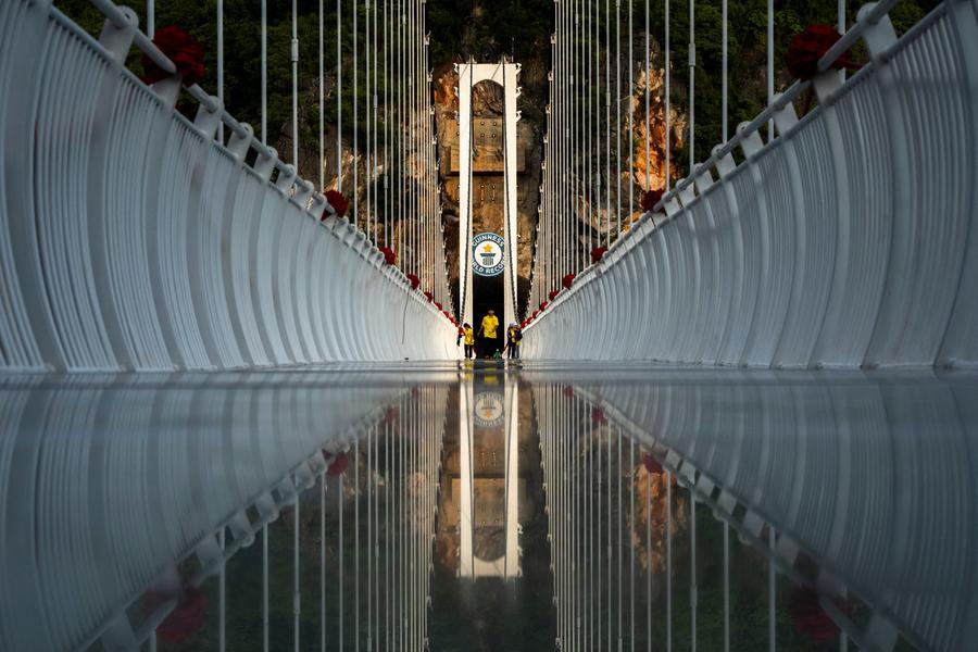 'Don't look down': Vietnam glass-bottomed bridge targets thrill-seekers