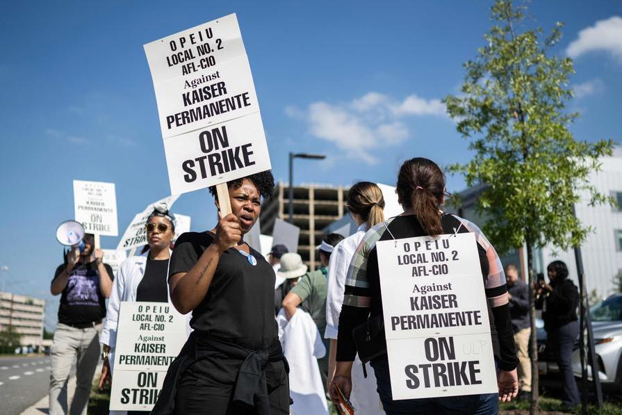US health care provider, unions reach strike deal