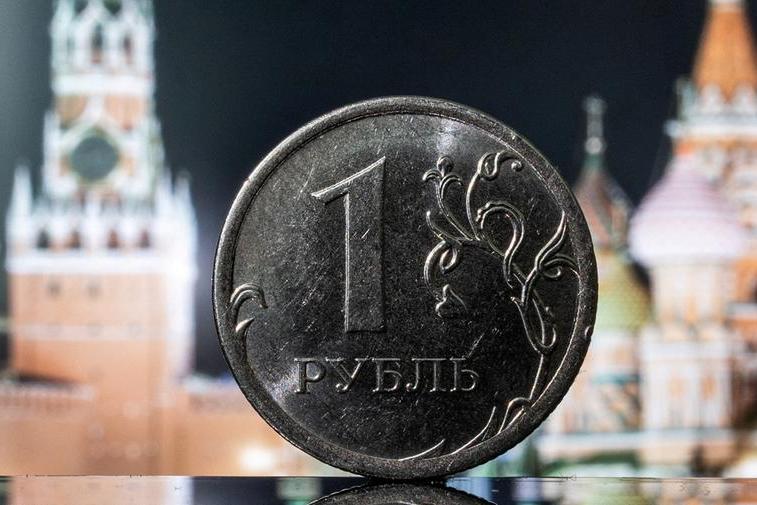 Russian rouble pares some losses after plunging to over 15-month low