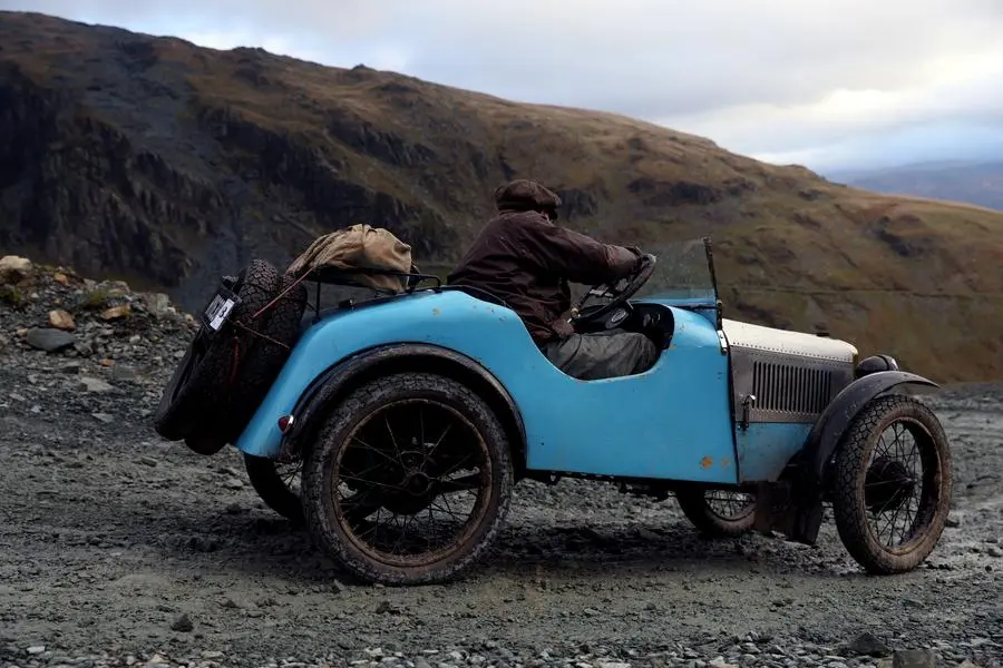 Vintage cars attack British hill climb
