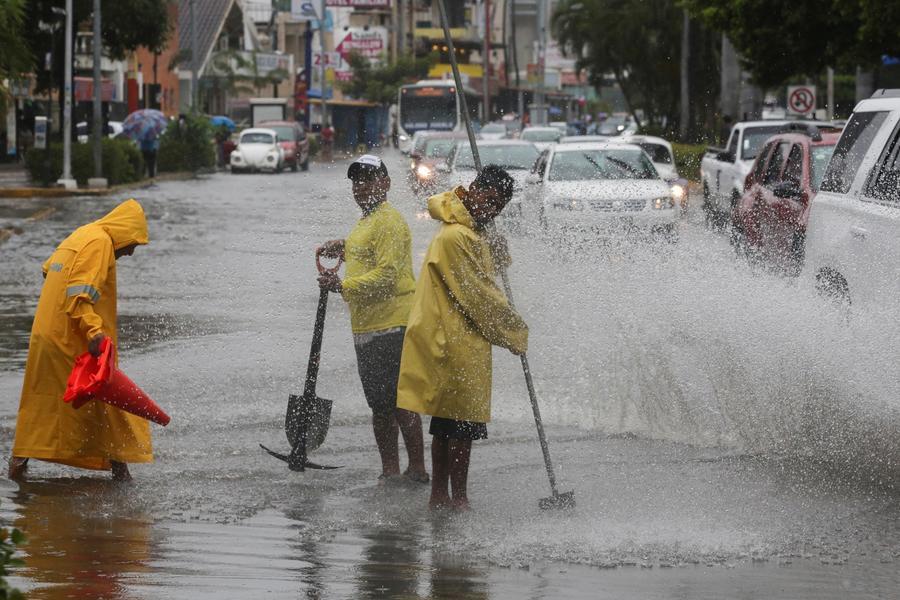 Remnants of typhoon bring floods to Alaska's western coast