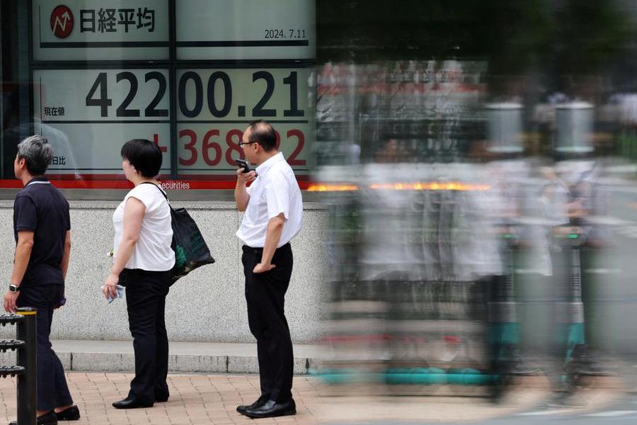 Japanese stocks head for best week in 4 years as receding growth fears ...
