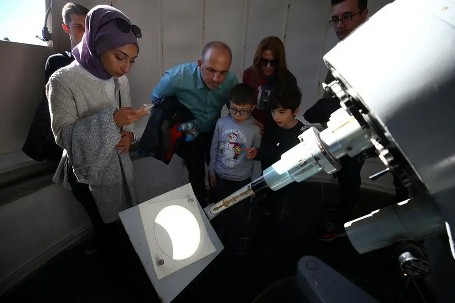 Partial solar eclipse graces the skies