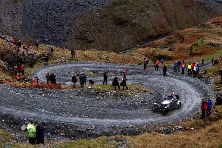 Vintage cars attack British hill climb