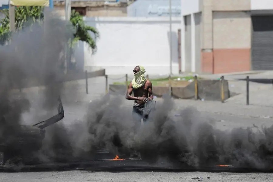 Violent protests in Haiti over rising prices and crime