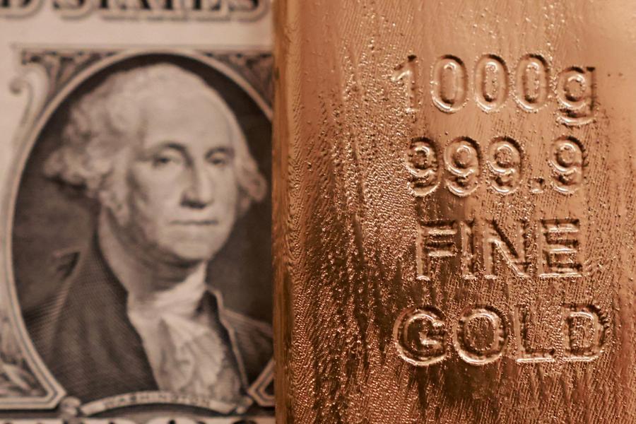 Gold jumps on weaker dollar, Middle East peace hopes