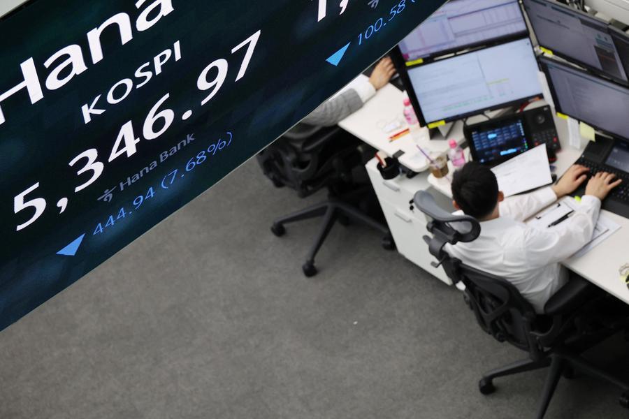 Asian stocks hit record high, dollar wobbles on peace deal hopes