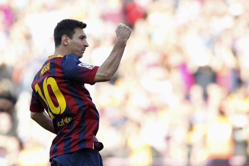 Barca cut deficit to Real thanks to magical Messi