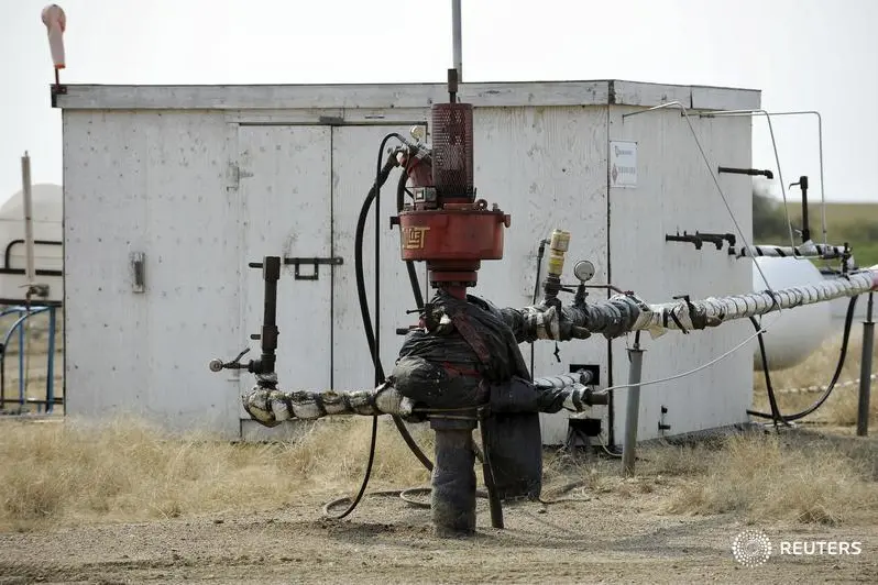 FEATURE-Canada's oil boomtown painfully adjusts to life after bust