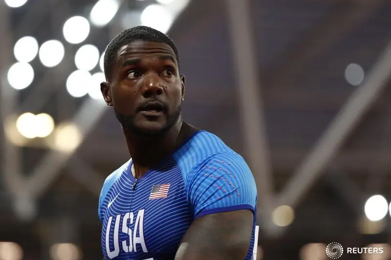Gatlin's father flays London crowd for booing son