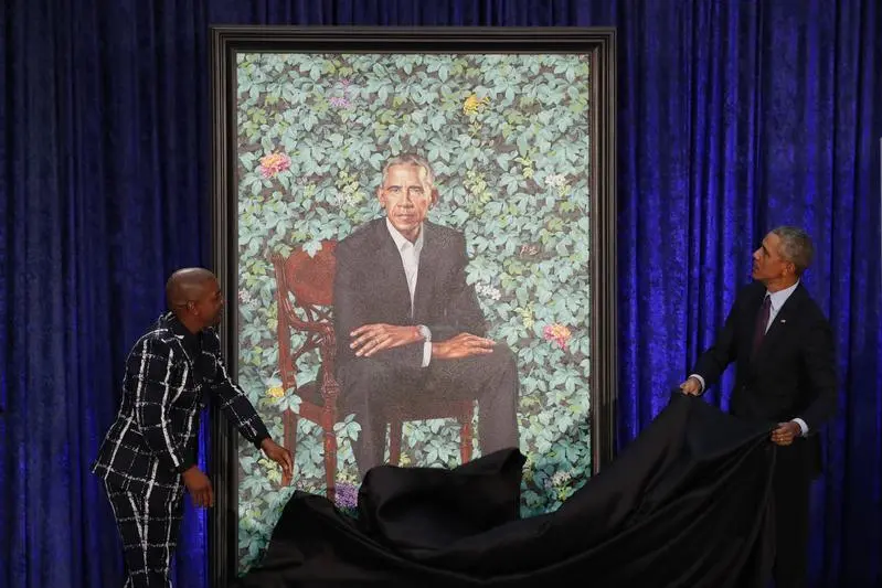 Obamas unveil official portraits