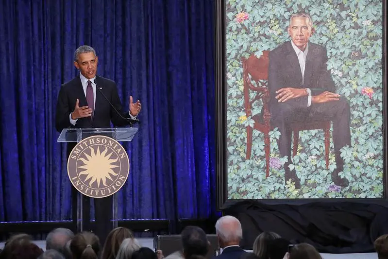Obamas unveil official portraits
