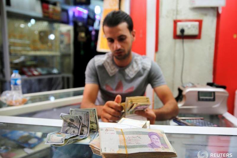 Iran draws up plan to slash zeroes off weakened currency
