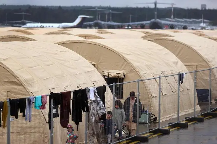 Thousands of Afghan refugees housed in temporary shelters