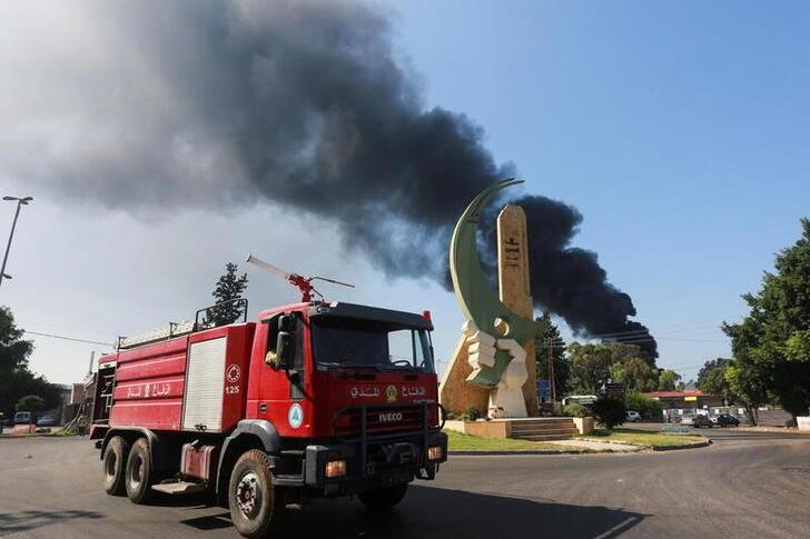 Lebanese firefighters put out fire at fuel facility